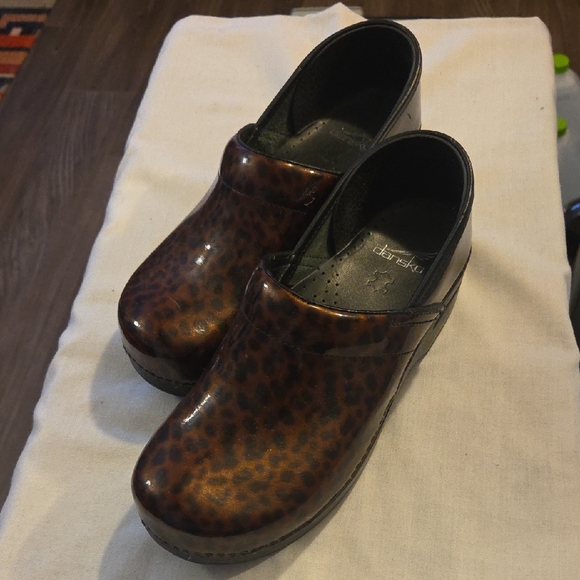 Dansko | Shoes | Dansko Brown Animal Print Clogs Size 95 40 | Poshmark